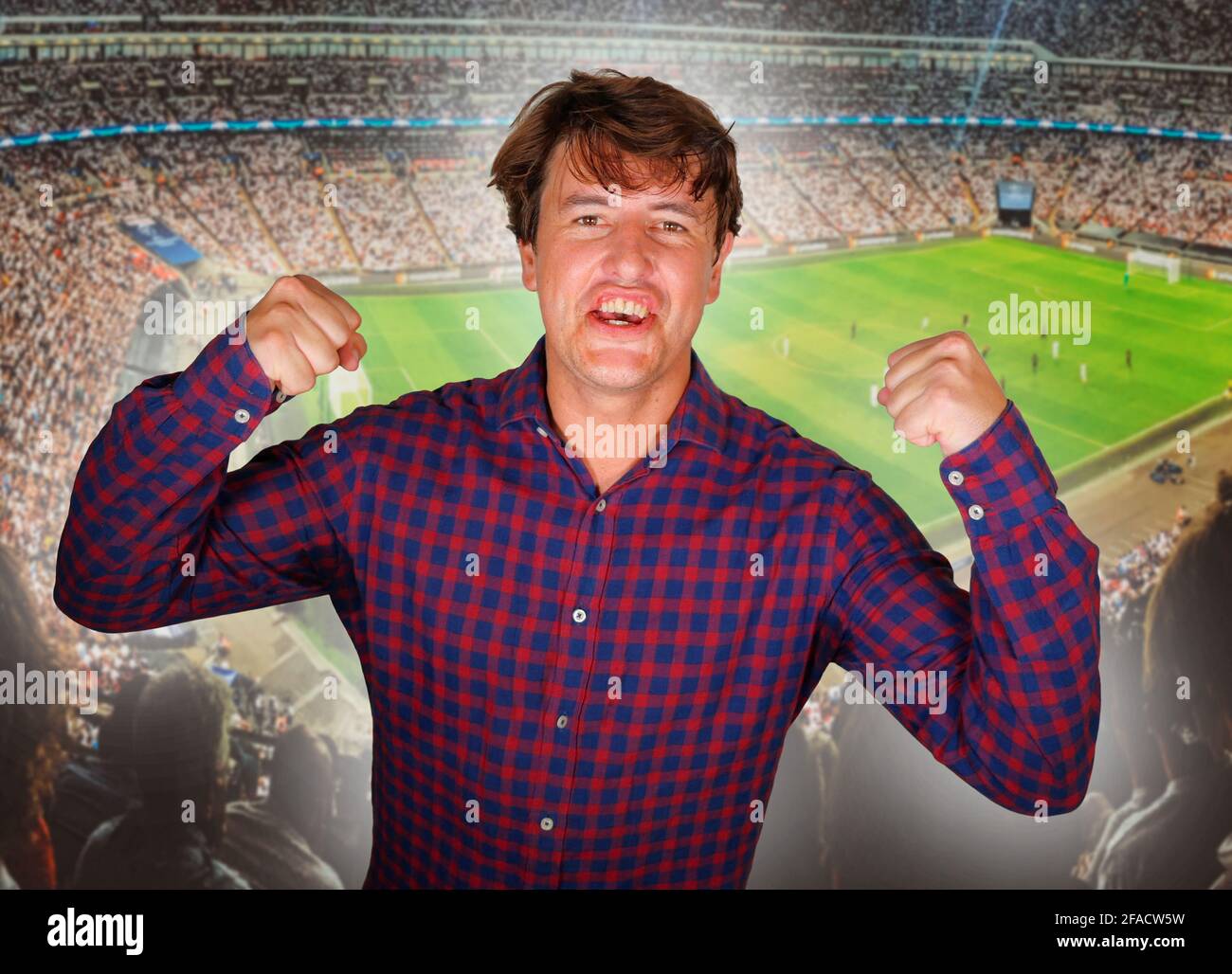 composite with happy and excited soccer fan man and football pitch ...