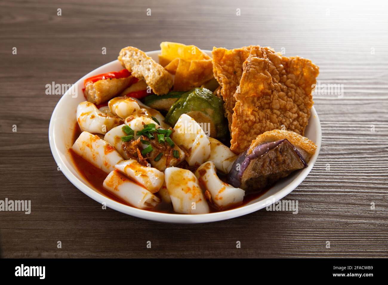 Chee Cheong Fun or Rice Noodle with sesame and sweet sauce served with ...