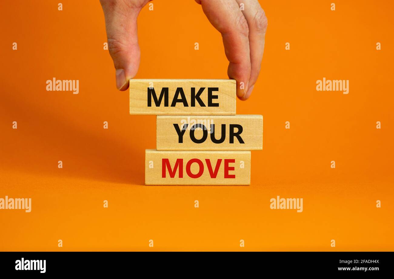 Make your move symbol. Wooden blocks with words 'Make your move ...