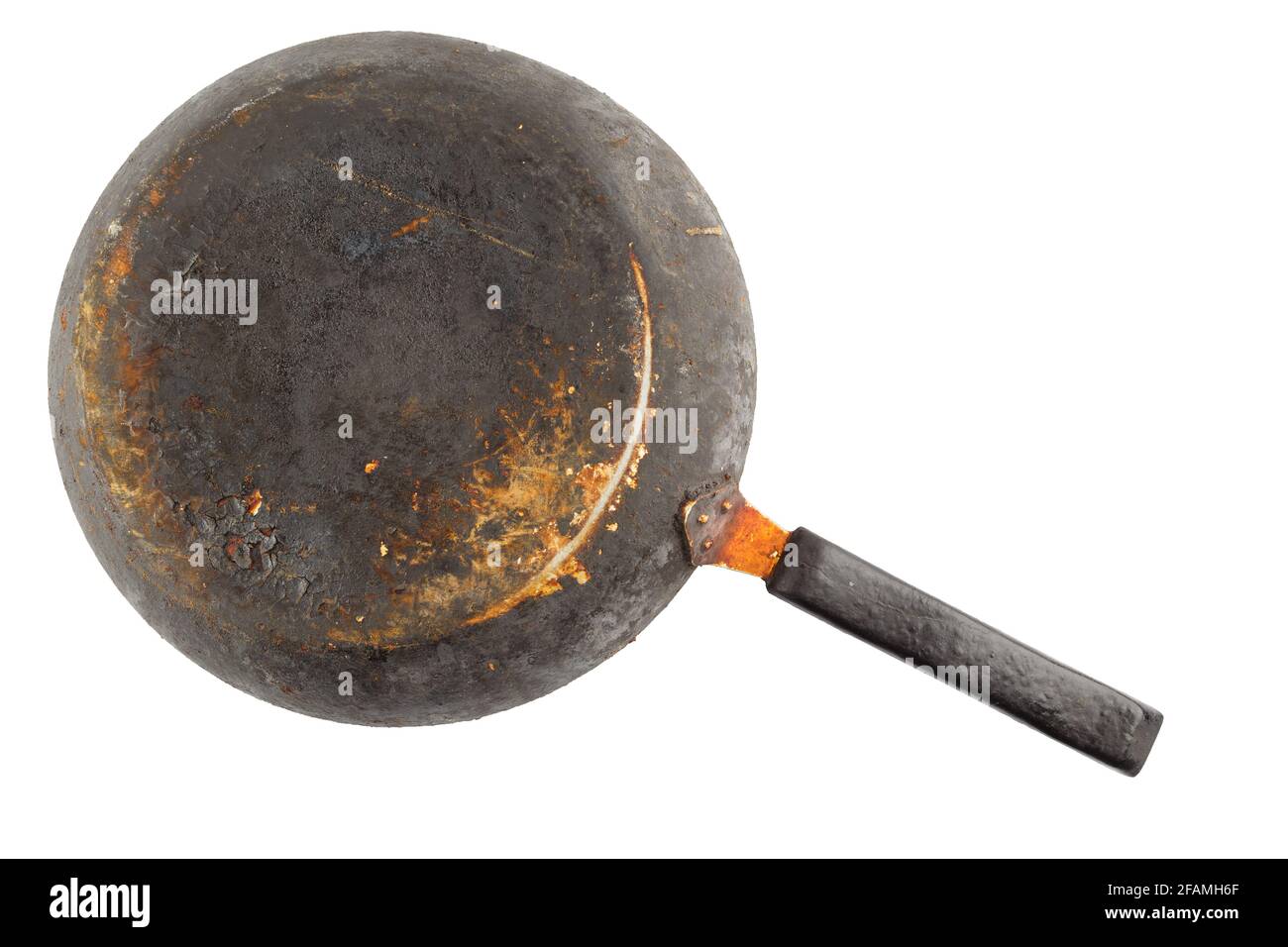 old stained rusty cast iron pan with burnt fat isolated on white bottom ...