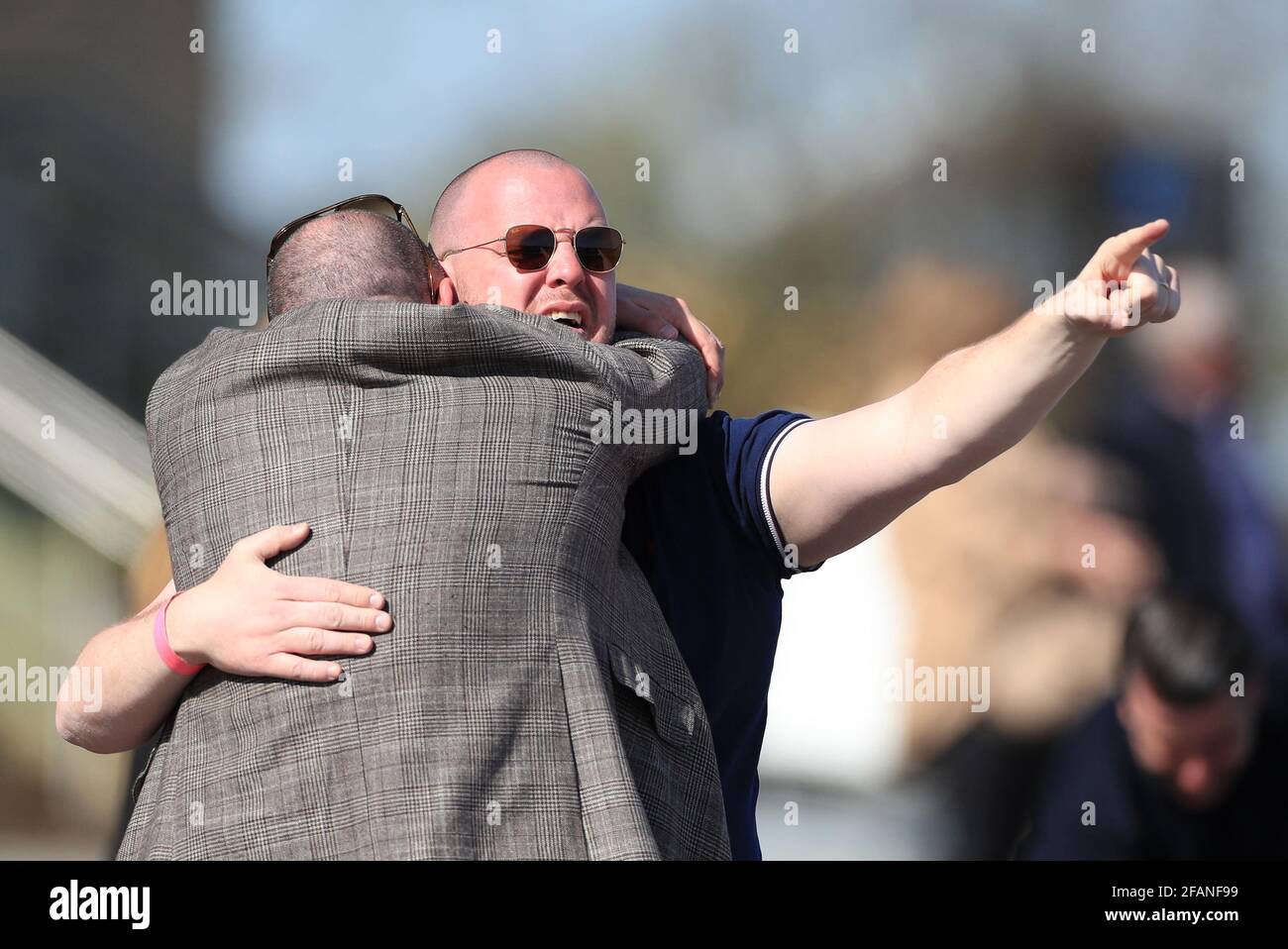 The owners of Ben Lilly celebrate their horse winning the Follow At The ...