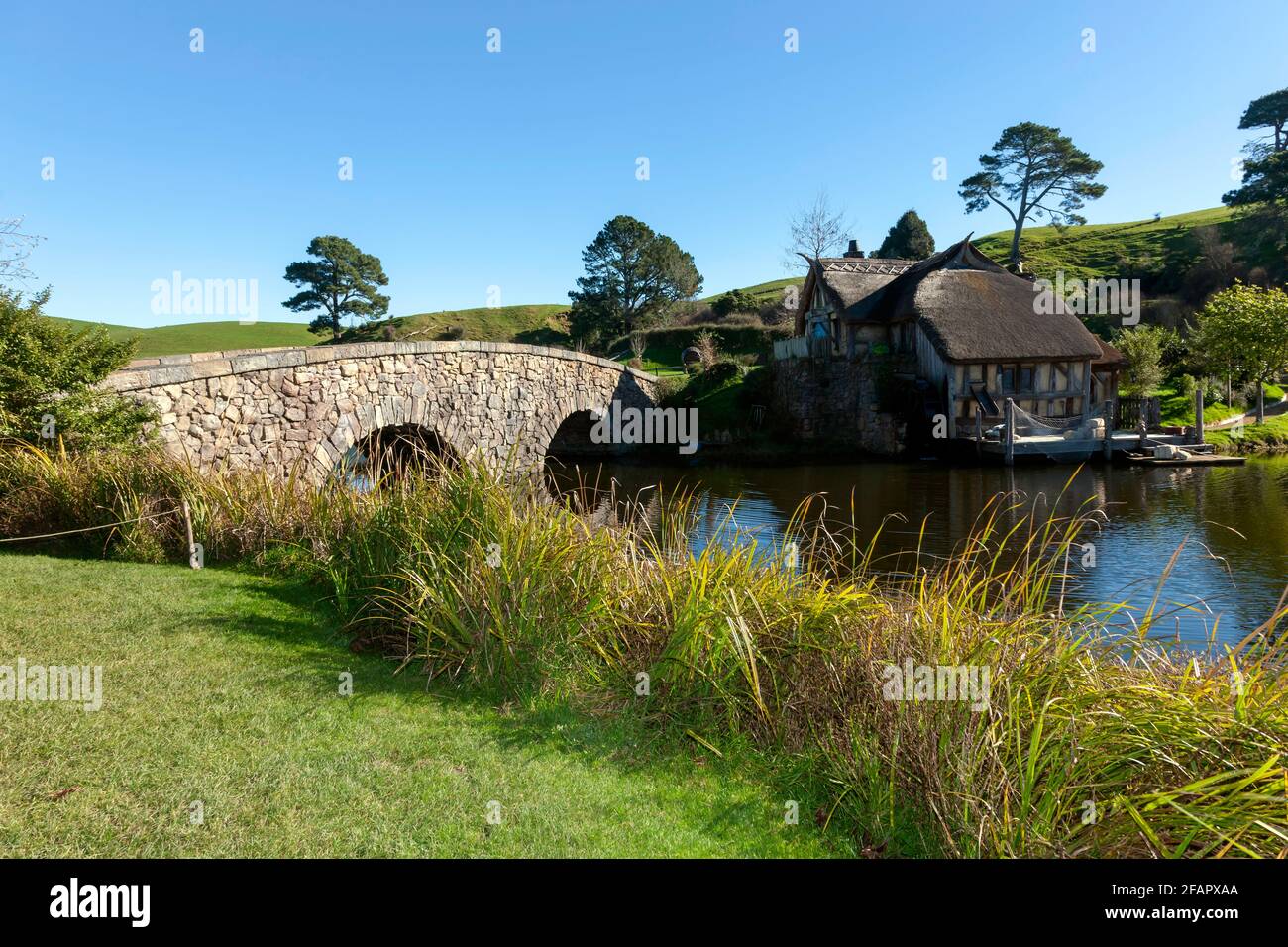 View of the Stone Bridge and Mill, on the Hobbiton Movie Set, Matamata ...