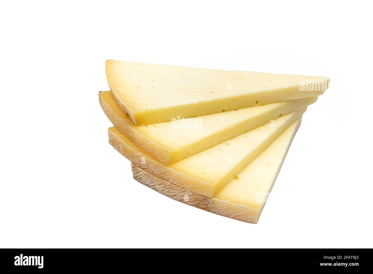 Triangular slice of old cheddar cheese. Piece of yellow cheese with ...