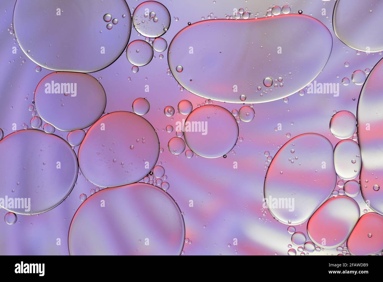Colorful artistic of oil drop floating on the water Stock Photo - Alamy