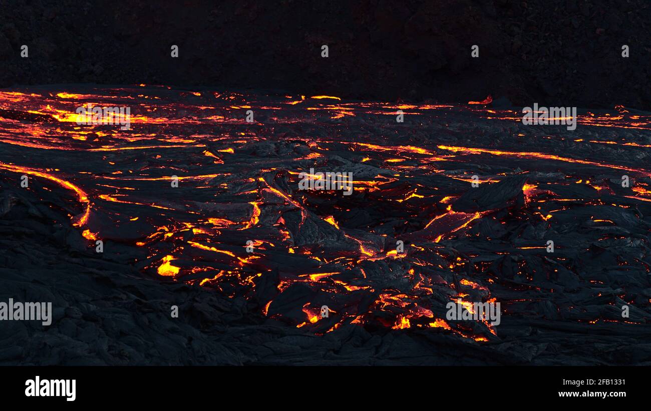 Volcanic eruption site night glowing hi-res stock photography and ...