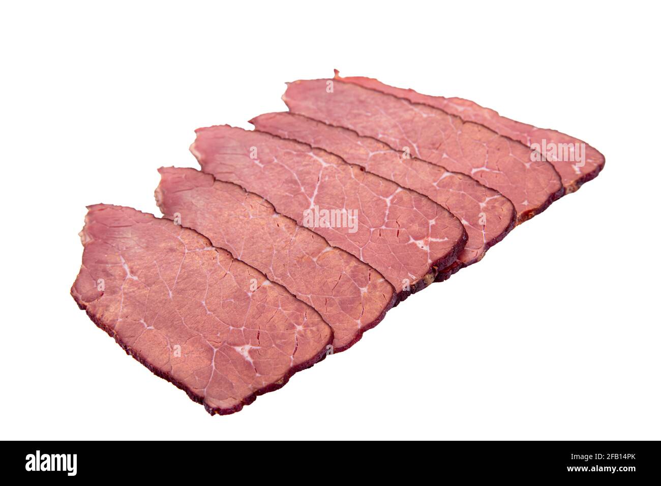 Dried meat slices. Beef jerky pieces isolated on a white background ...