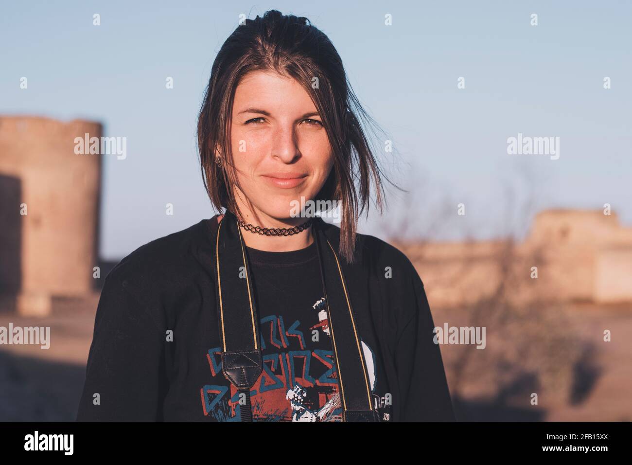 Young photographer girl works with professional camera Stock Photo - Alamy