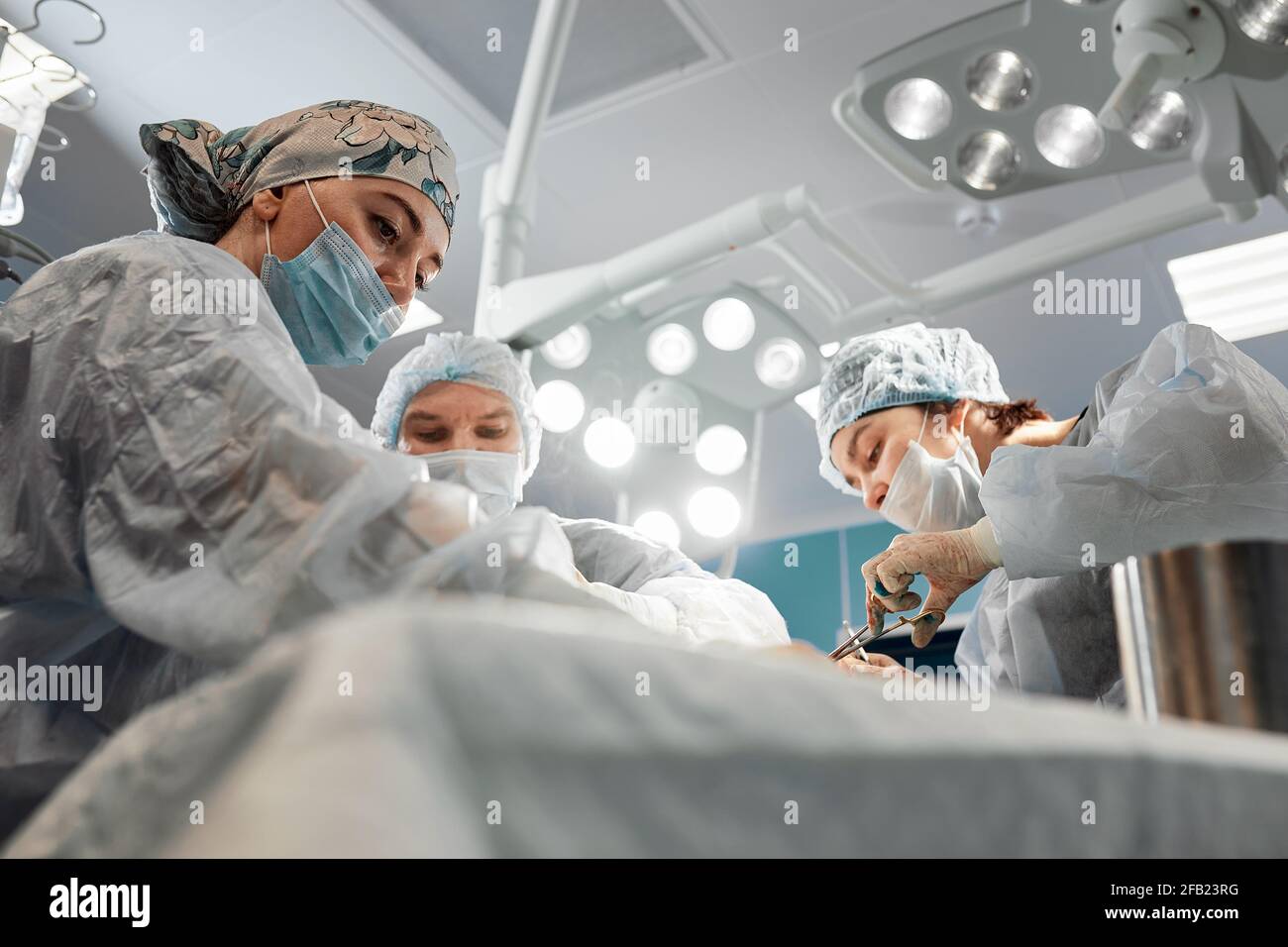 Team surgeon at work in operating room Stock Photo - Alamy
