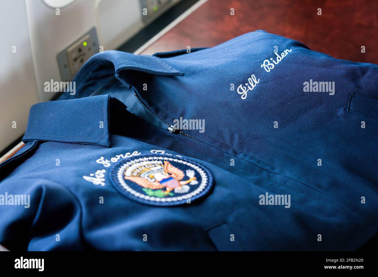 First Lady Jill Biden’s Air Force One embroidered jacket lays folded ...