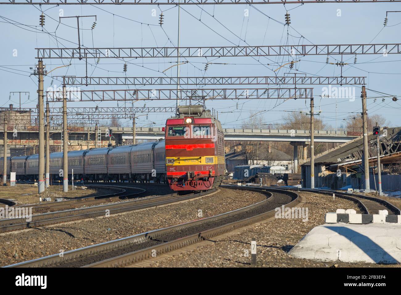 SHARYA, RUSSIA - APRIL 10, 2021: Czech electric locomotive ChS-4t with ...