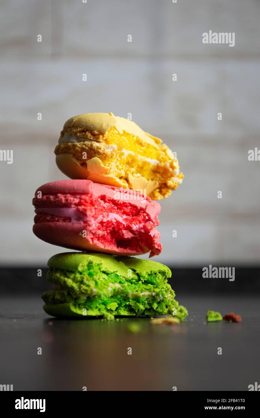 Multi-colored macarons in the kitchen Stock Photo - Alamy