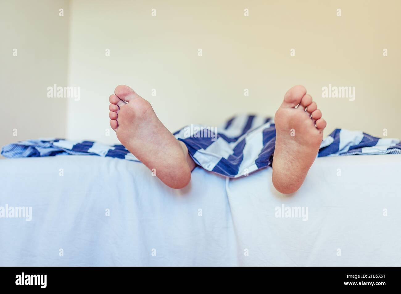 Barefoot male feet sleep hi-res stock photography and images - Alamy