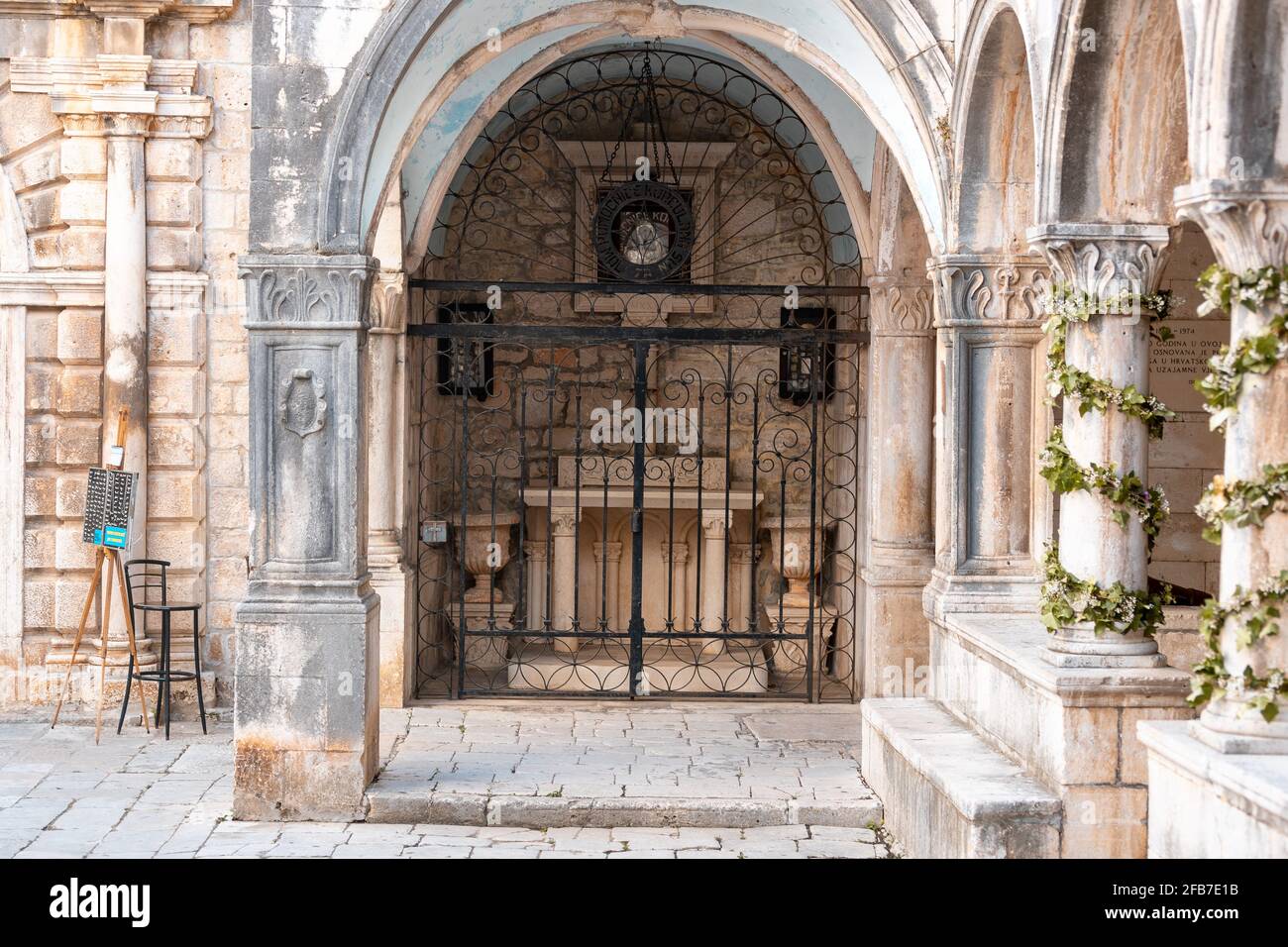 Closeup of a church altar with decorated pillars outside Stock Photo ...