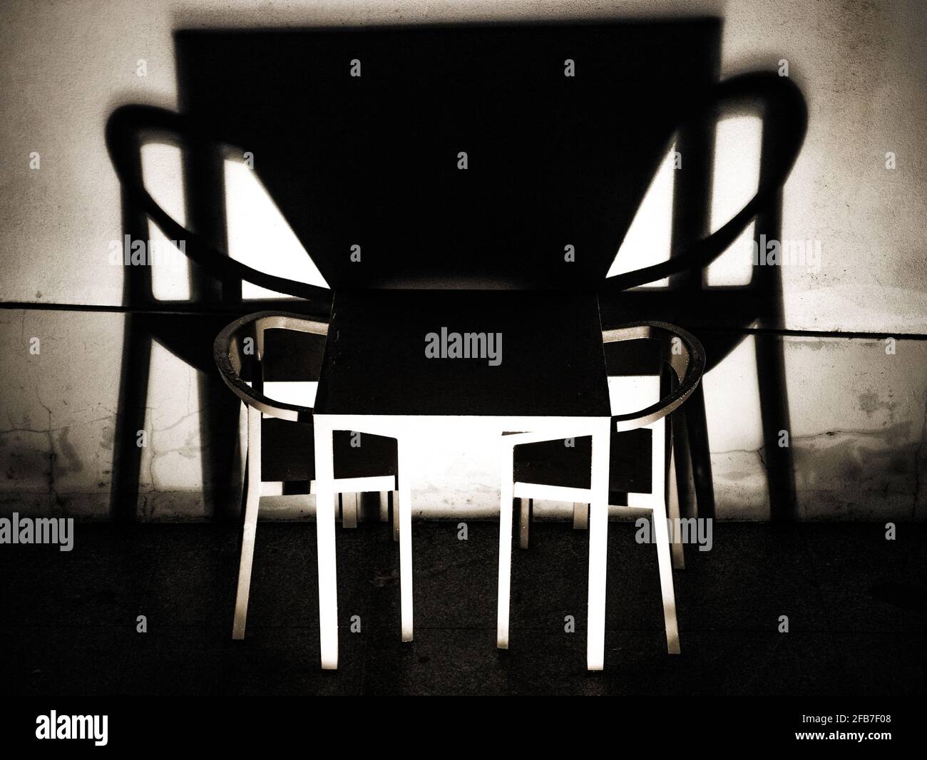 Composition of black and white - chairs and table - closed during ...