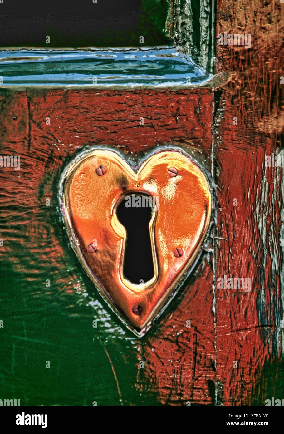 Heart shaped keyhole on door, close-up Stock Photo - Alamy