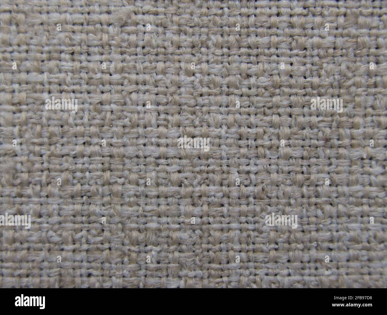 Full frame background of neutral coloured textured fabric with ...