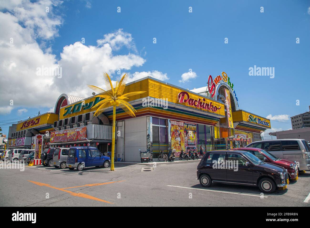 External colourful facade of Sunshine Pachinko slot machine building ...