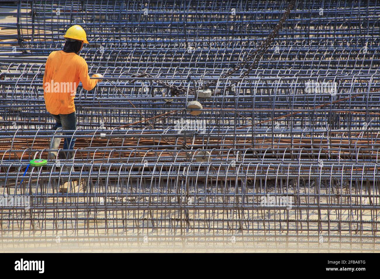 Construction worker And steel bars for tall building structures Stock ...