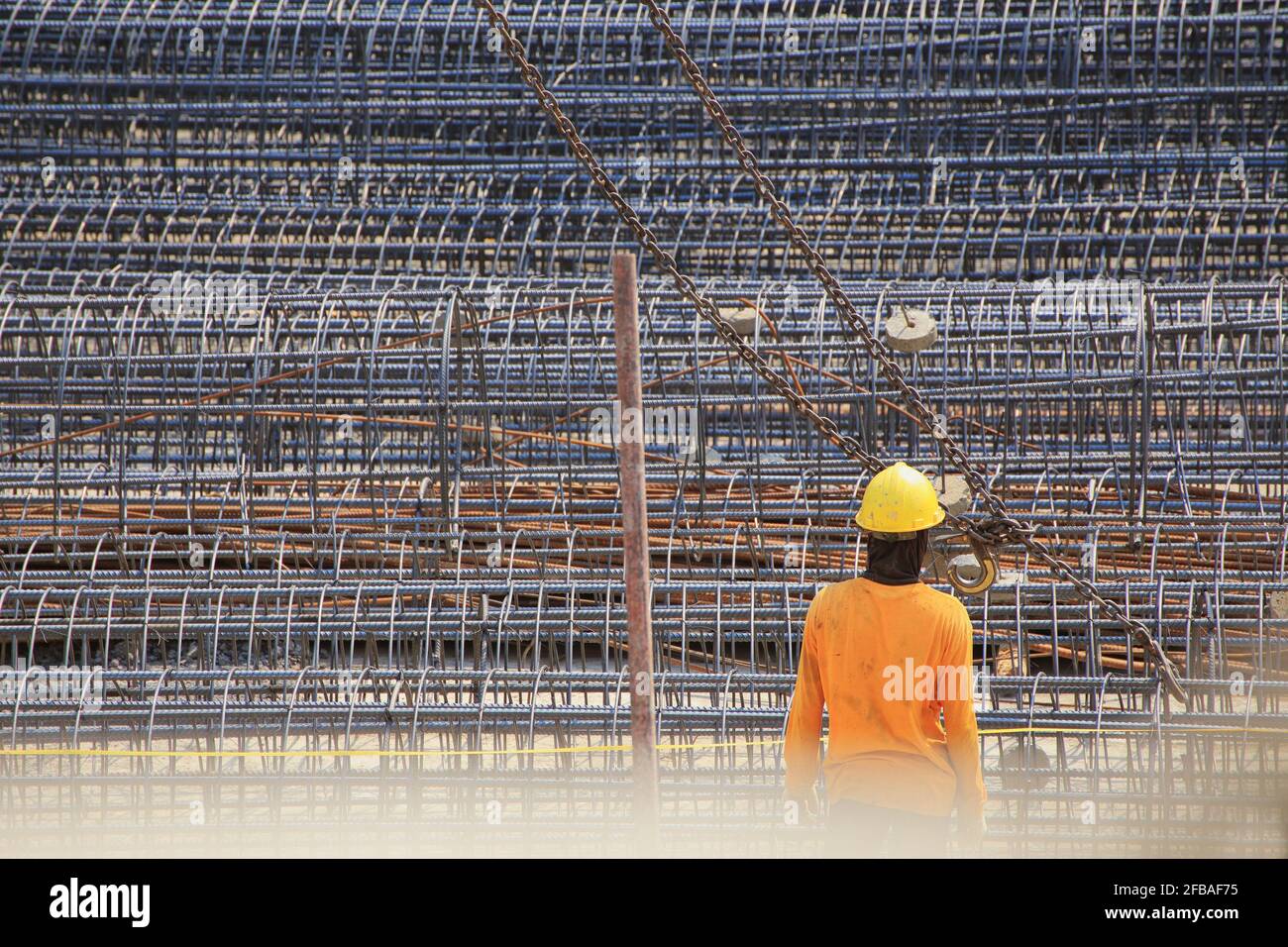 Construction worker And steel bars for tall building structures Stock ...