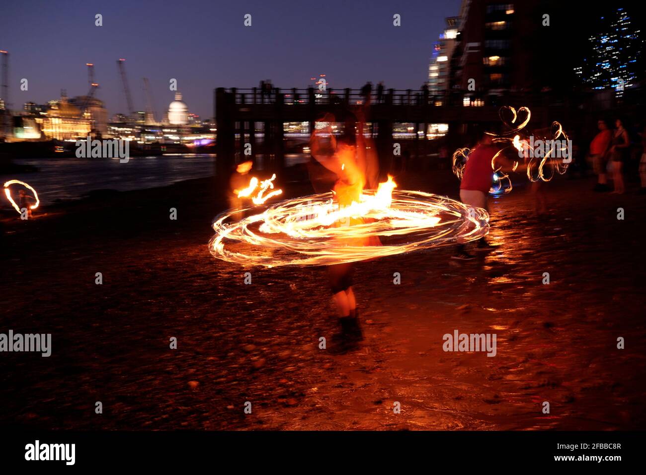 Fire Spinners, Southbank, London Stock Photo - Alamy