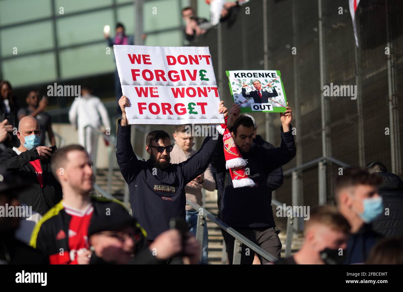 Fans protest against Arsenal owner Stan Kroenke before the Premier ...