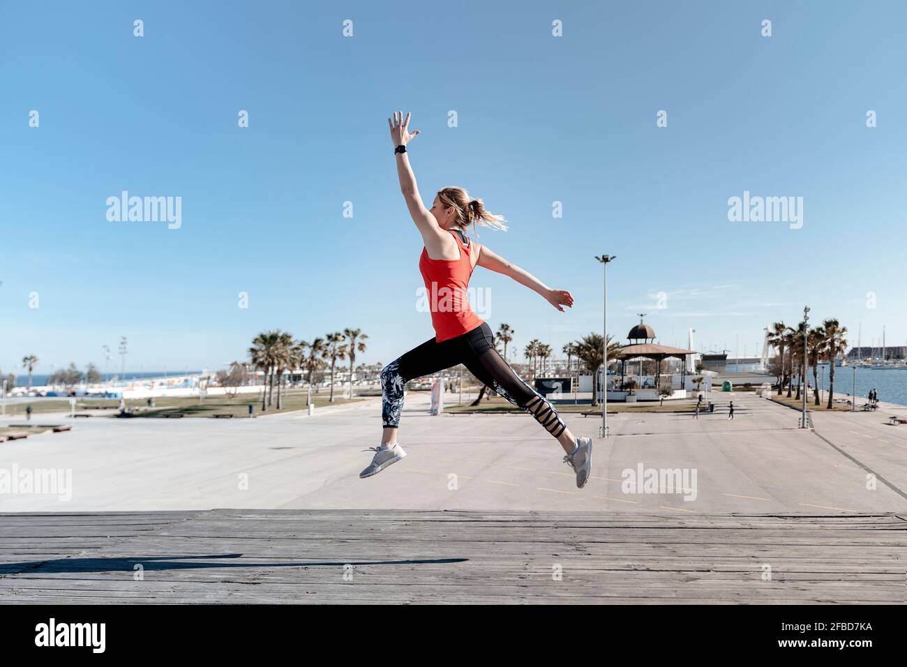 Athlete jumping on promenade hi-res stock photography and images - Alamy