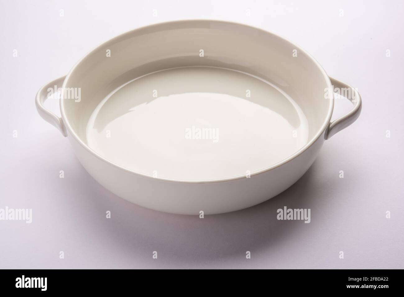 Empty white ceramic serving bowl, isolated over white or gray ...