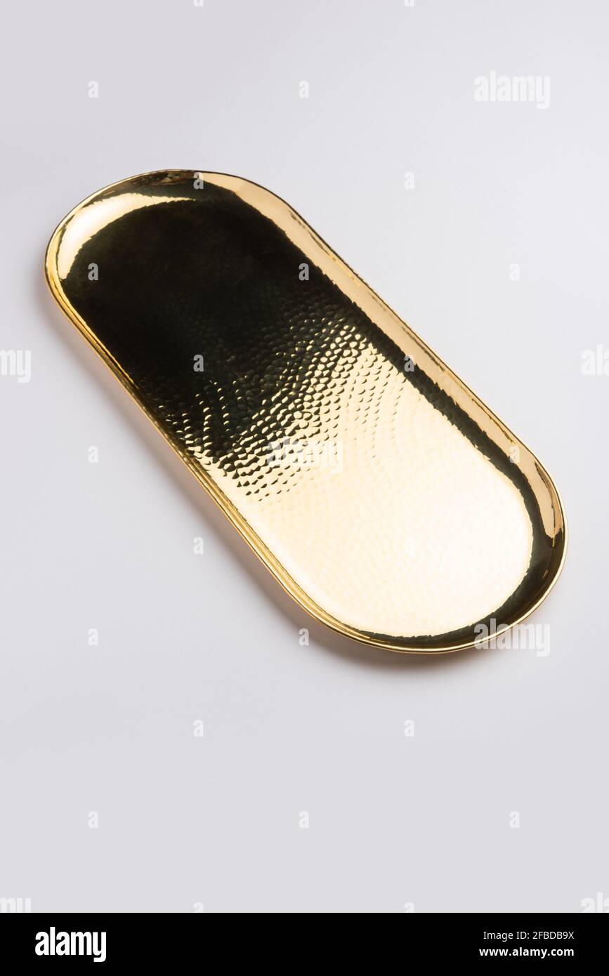 Empty oval or round shape thali or plate made up of brass, pital or ...