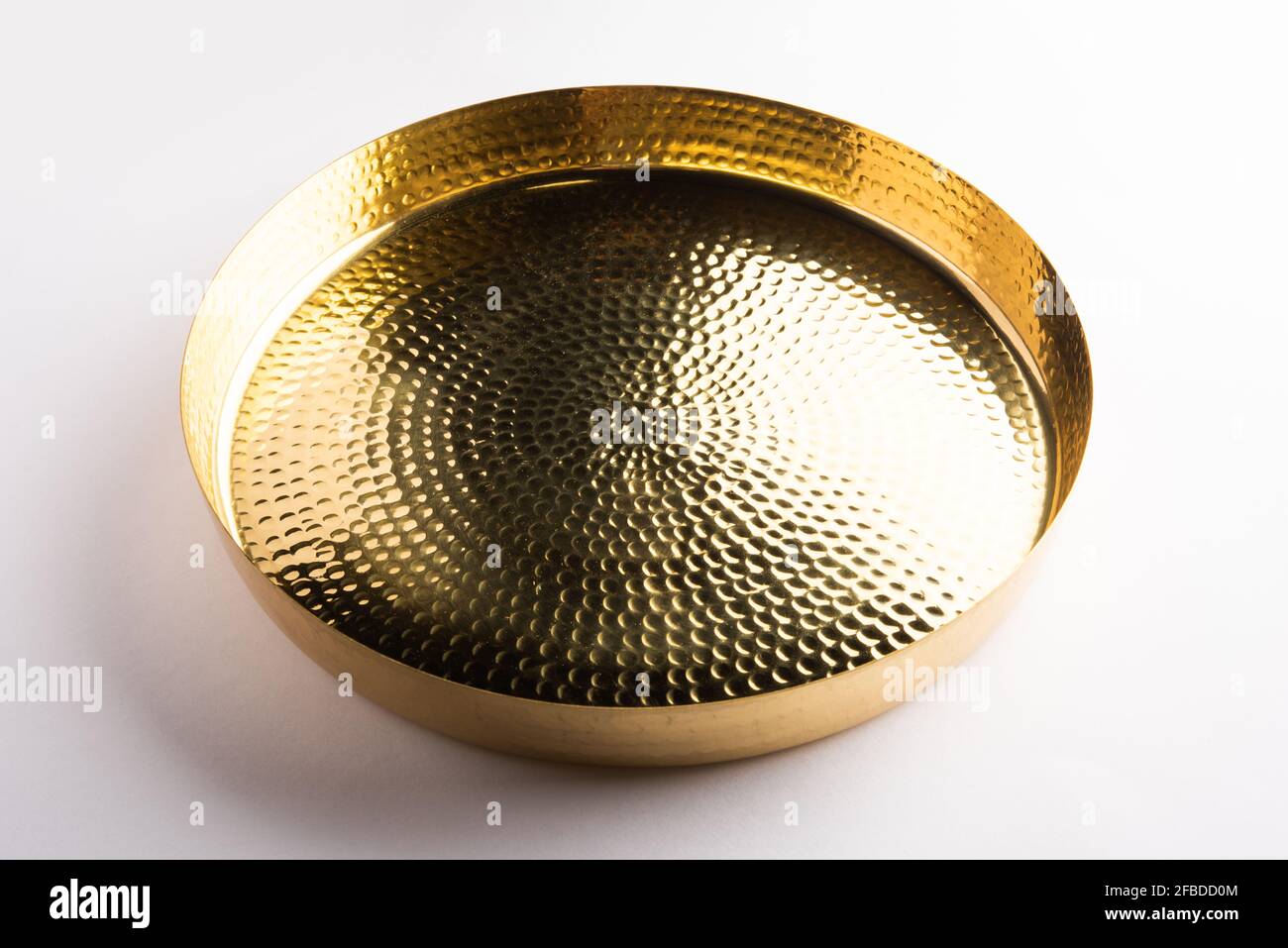 Empty oval or round shape thali or plate made up of brass, pital or ...