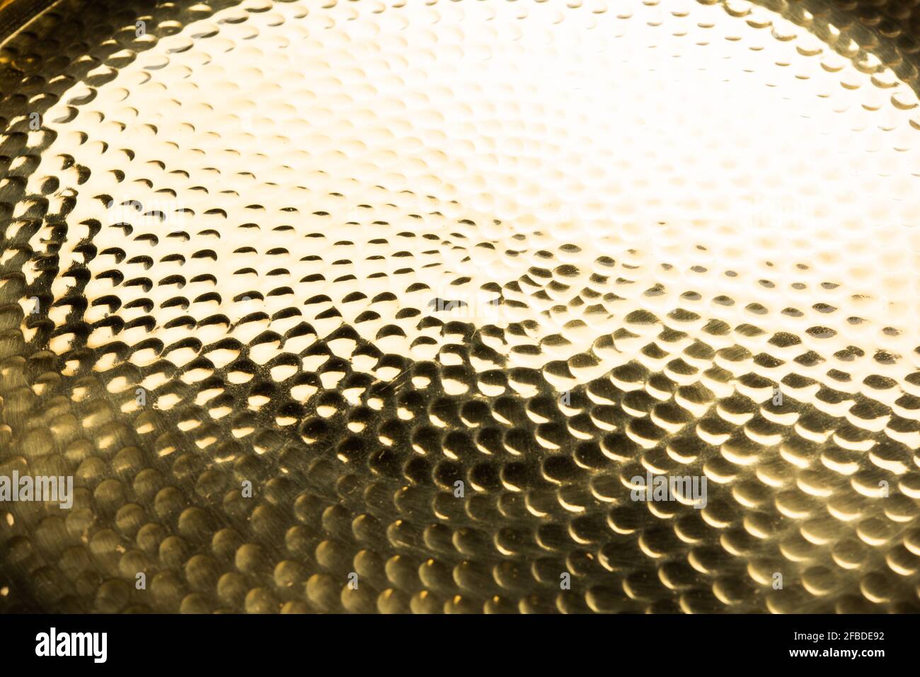 Hammered brass oval hi-res stock photography and images - Alamy