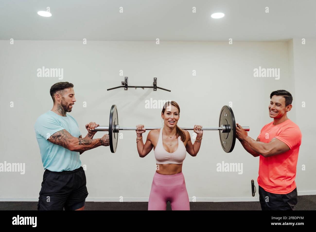 Man lifting gym smiling hi-res stock photography and images - Alamy