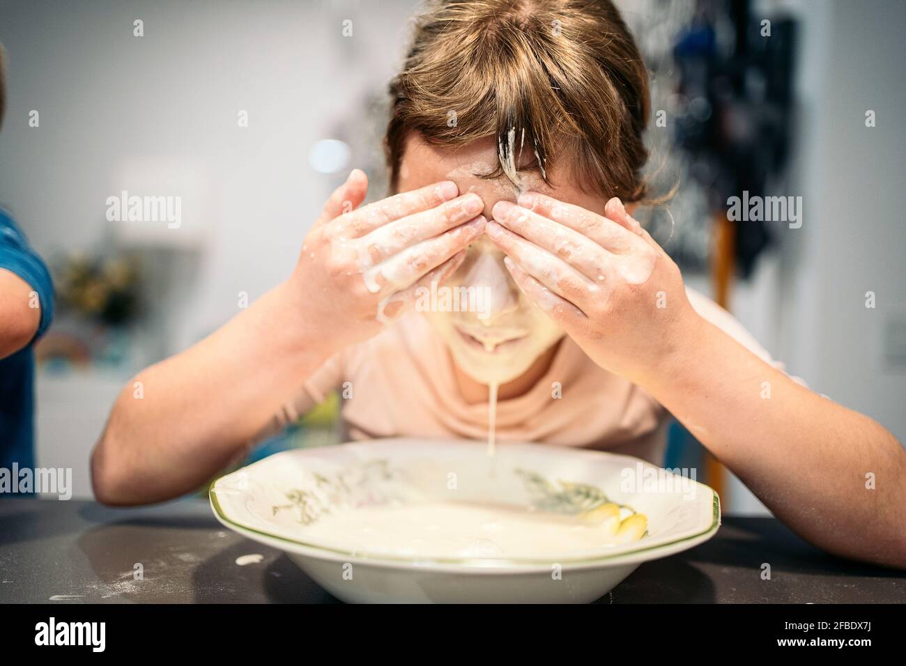 Girl with messy food face hi-res stock photography and images - Alamy