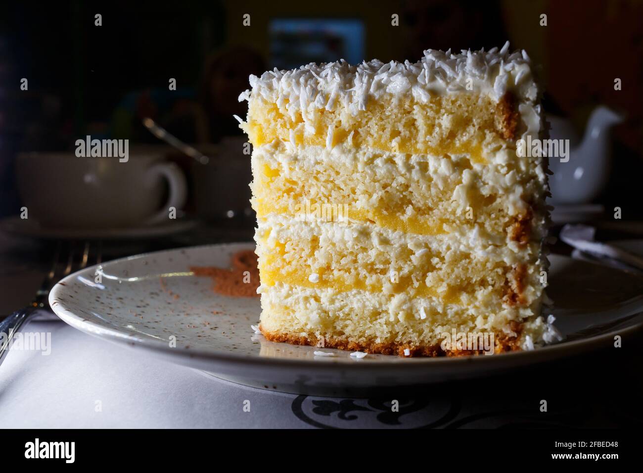 Delicious sweet piece of coconut cake with biscuit cakes Stock Photo ...
