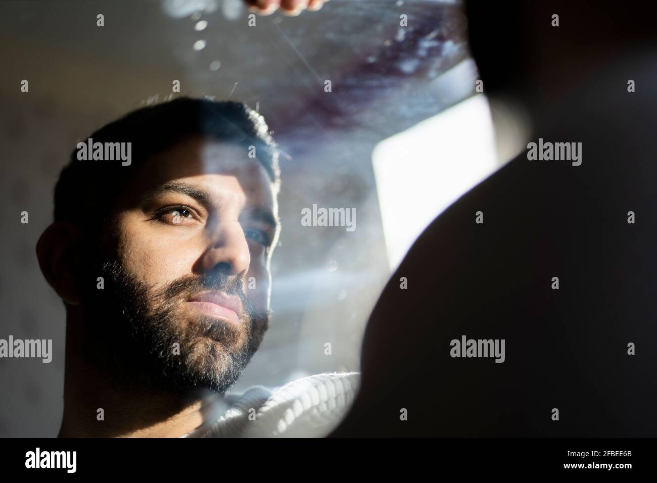 Person reflection mirror pensive hi-res stock photography and images ...