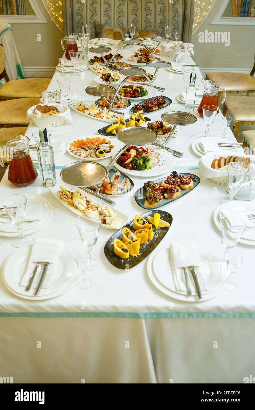 Delicious dish on the buffet table. Cold appetizers from the chef for ...