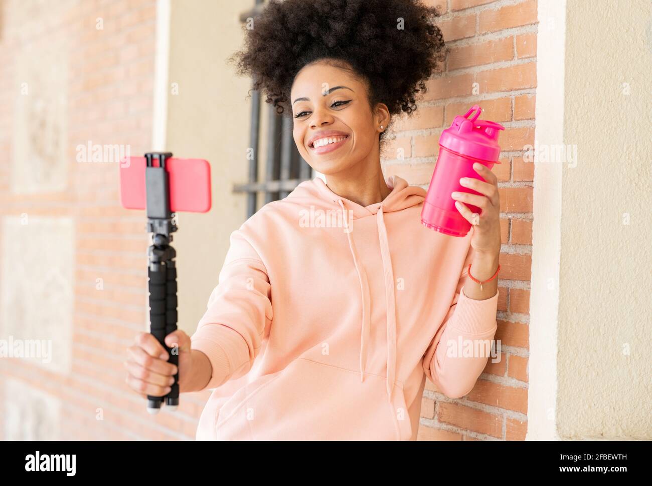 Woman leaning on tripod hi-res stock photography and images - Alamy