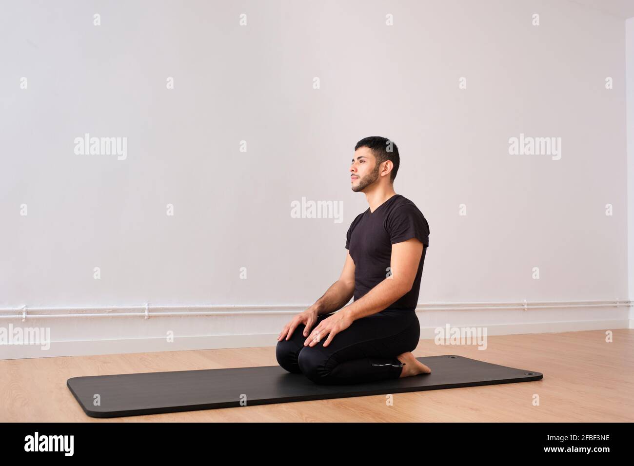 Kneeling man hi-res stock photography and images - Alamy