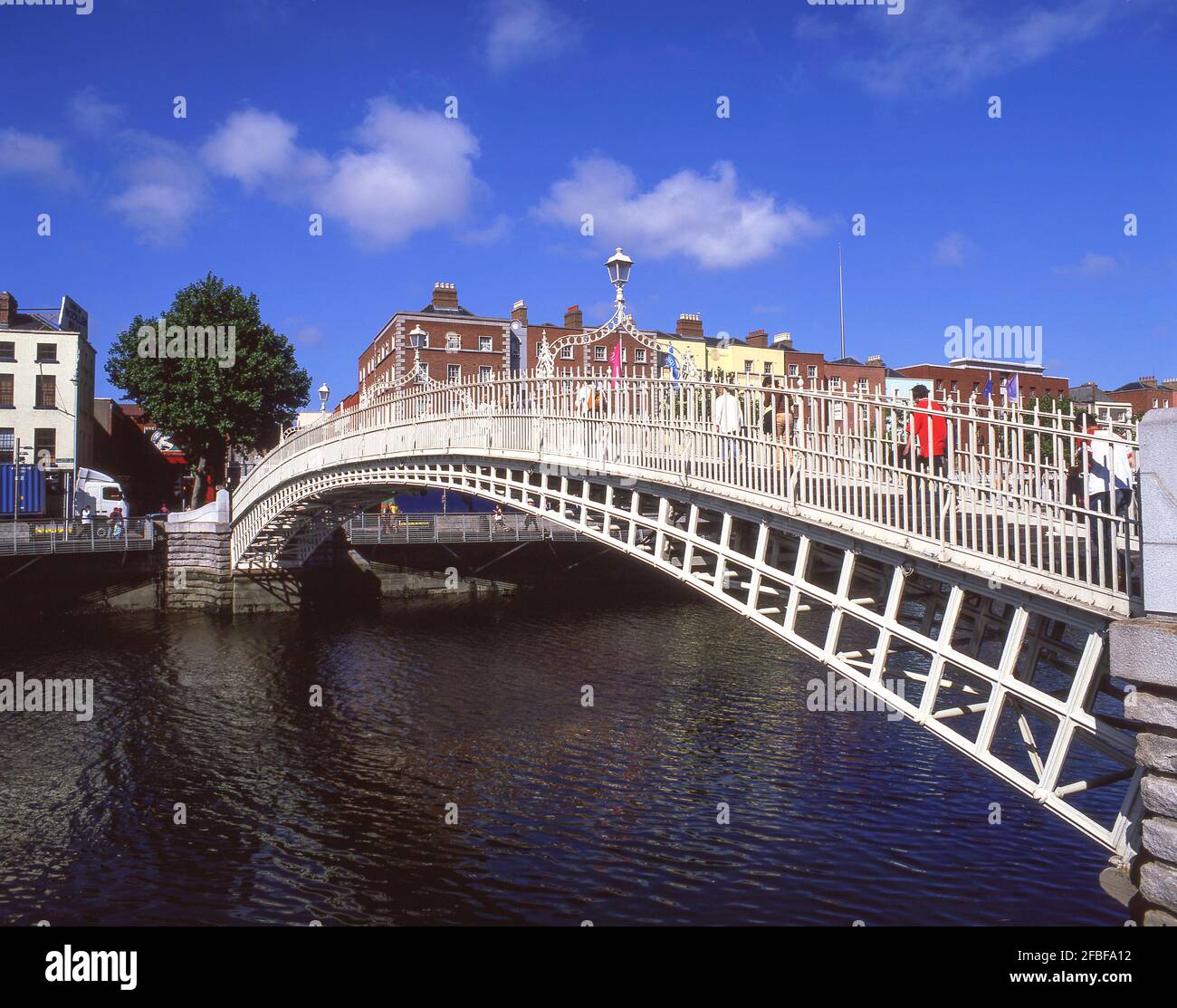 19th century hapenny bridge across river liffey wellington quay hi-res ...