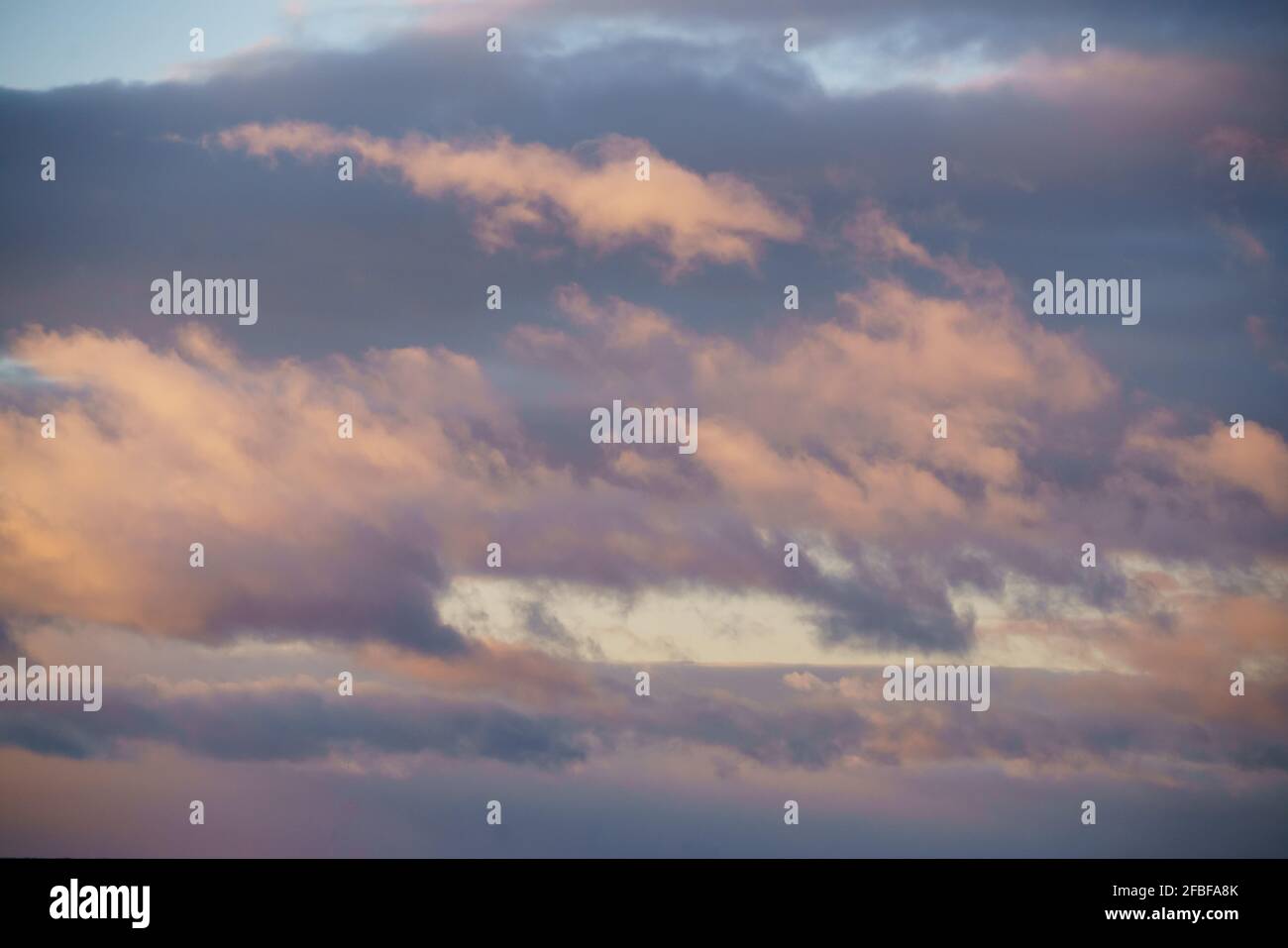 The sky at sunset. Not with clouds Stock Photo - Alamy