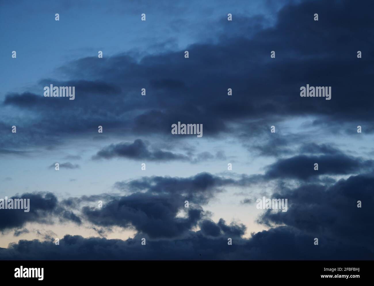 The sky at sunset. Not with clouds Stock Photo - Alamy