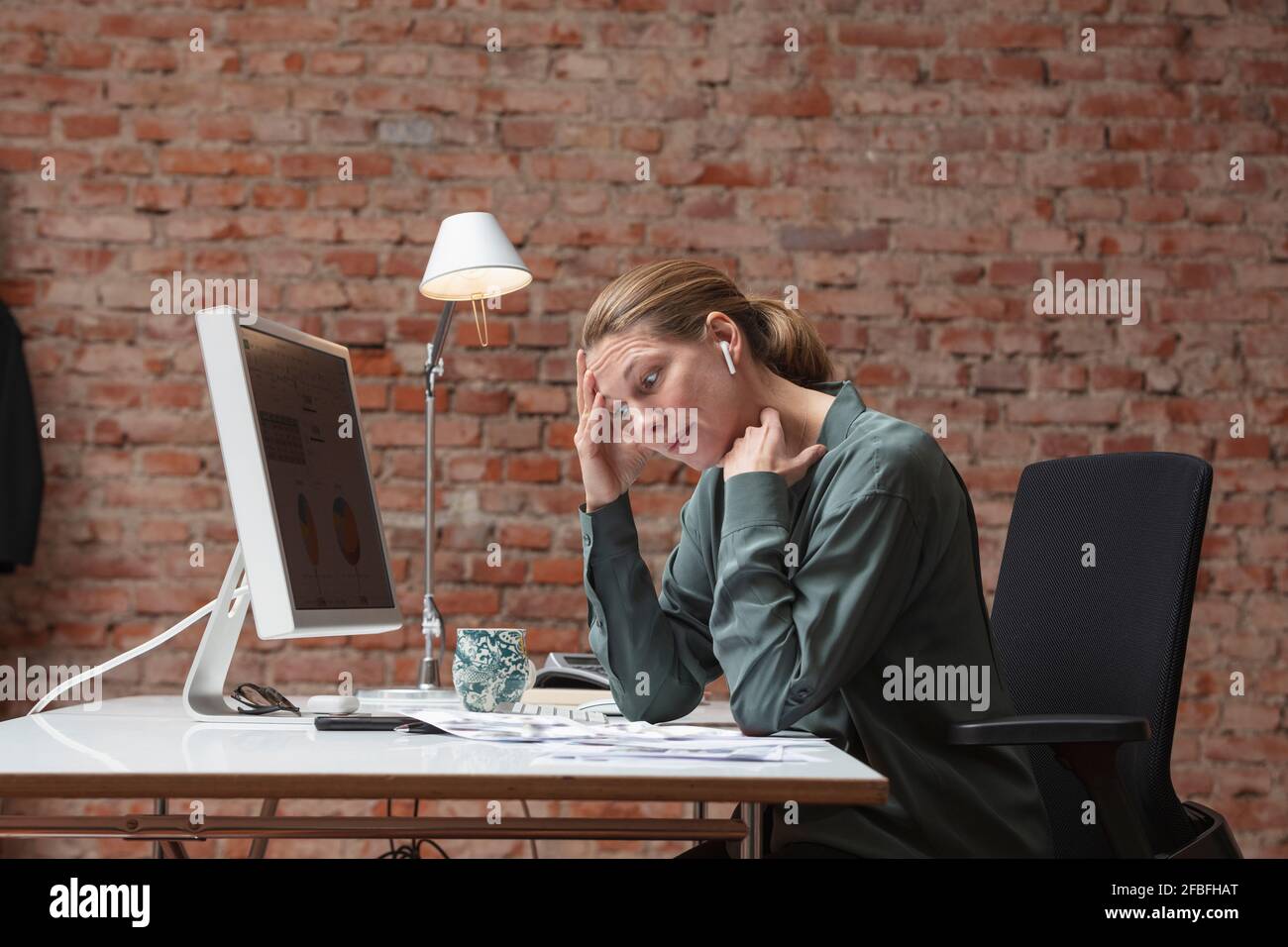 Sitting side by side communication document head in hand hi-res stock ...