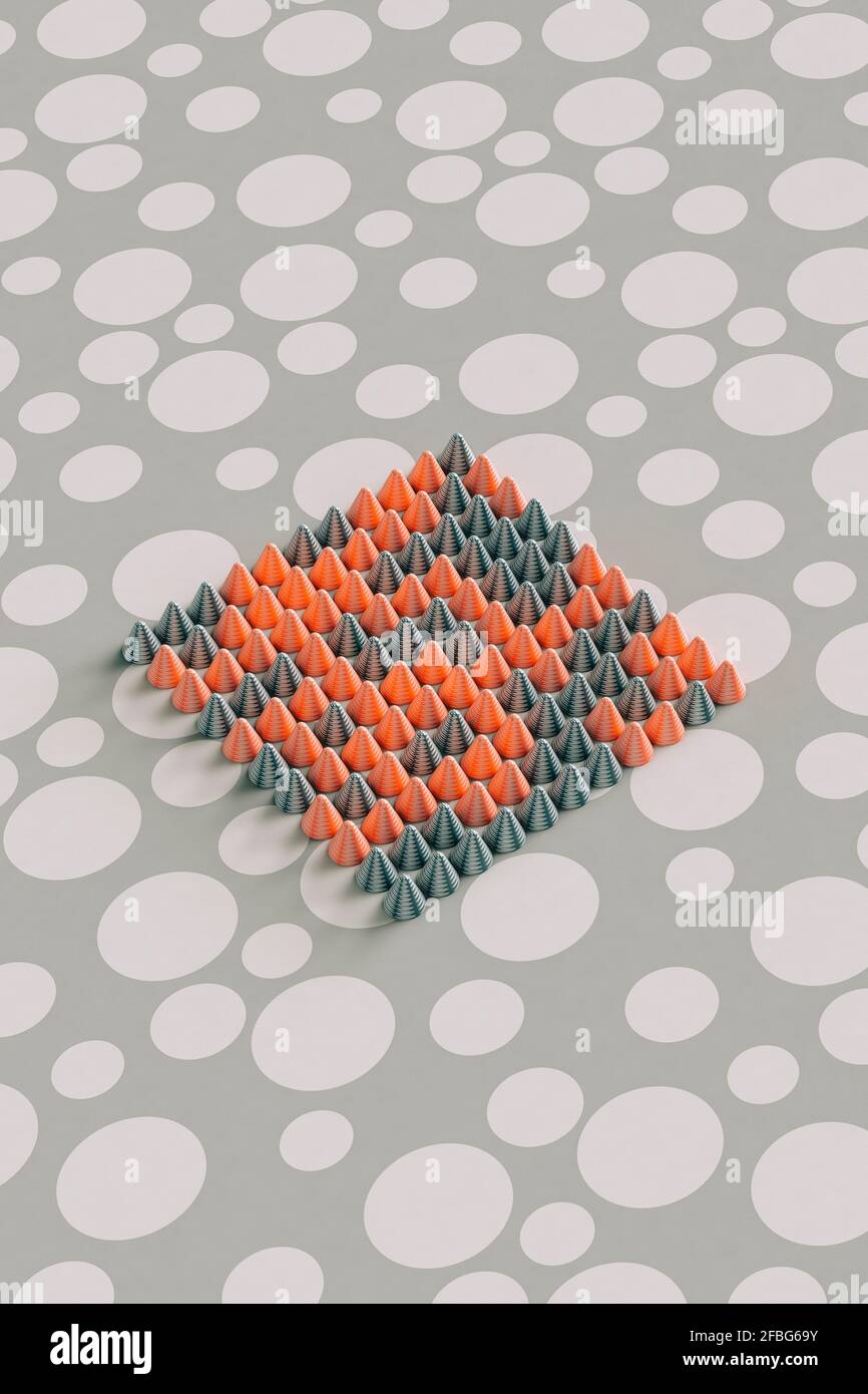 Three dimensional render of red and gray cones laid on polka dot ...