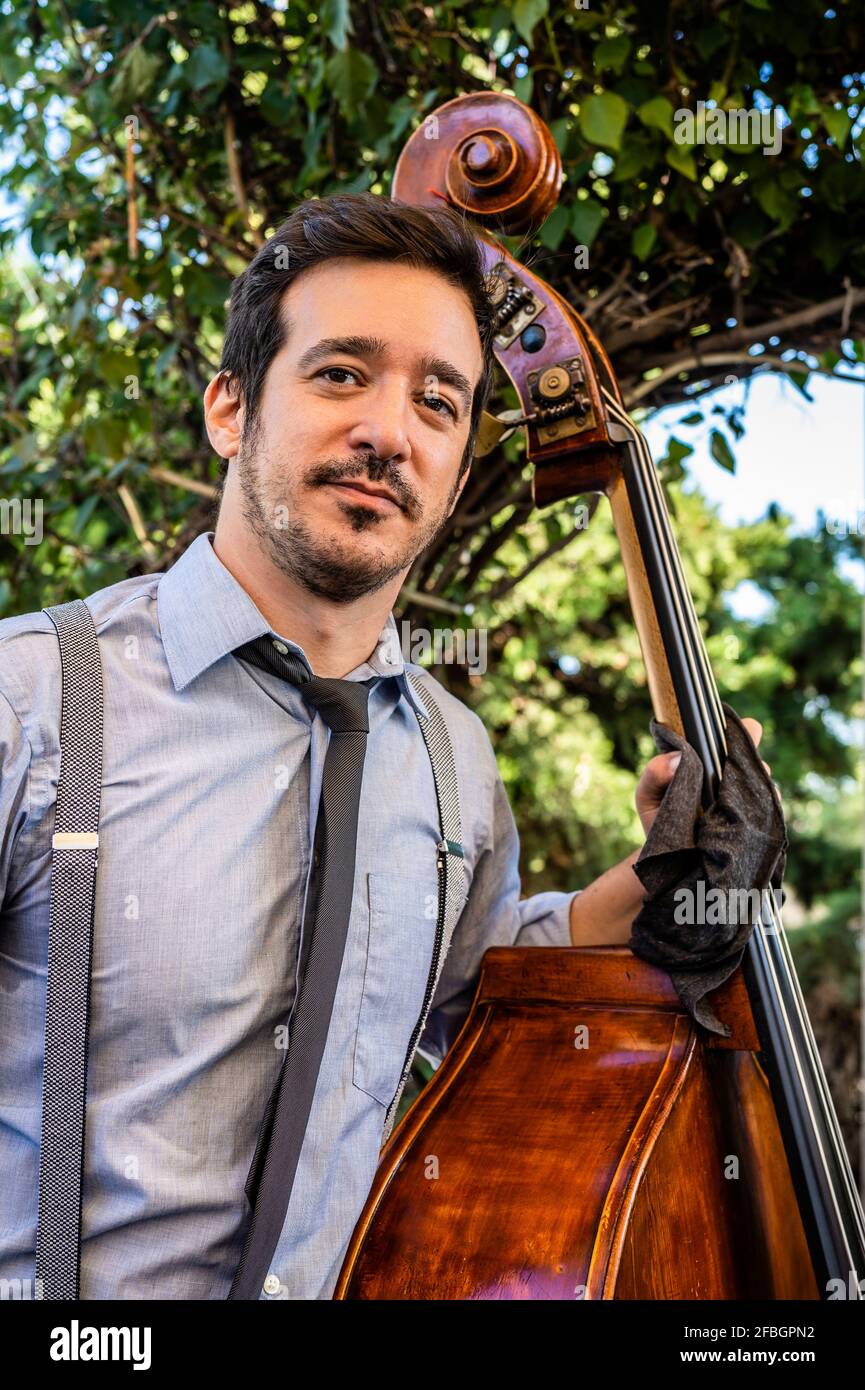 Person holding bass hi-res stock photography and images - Alamy