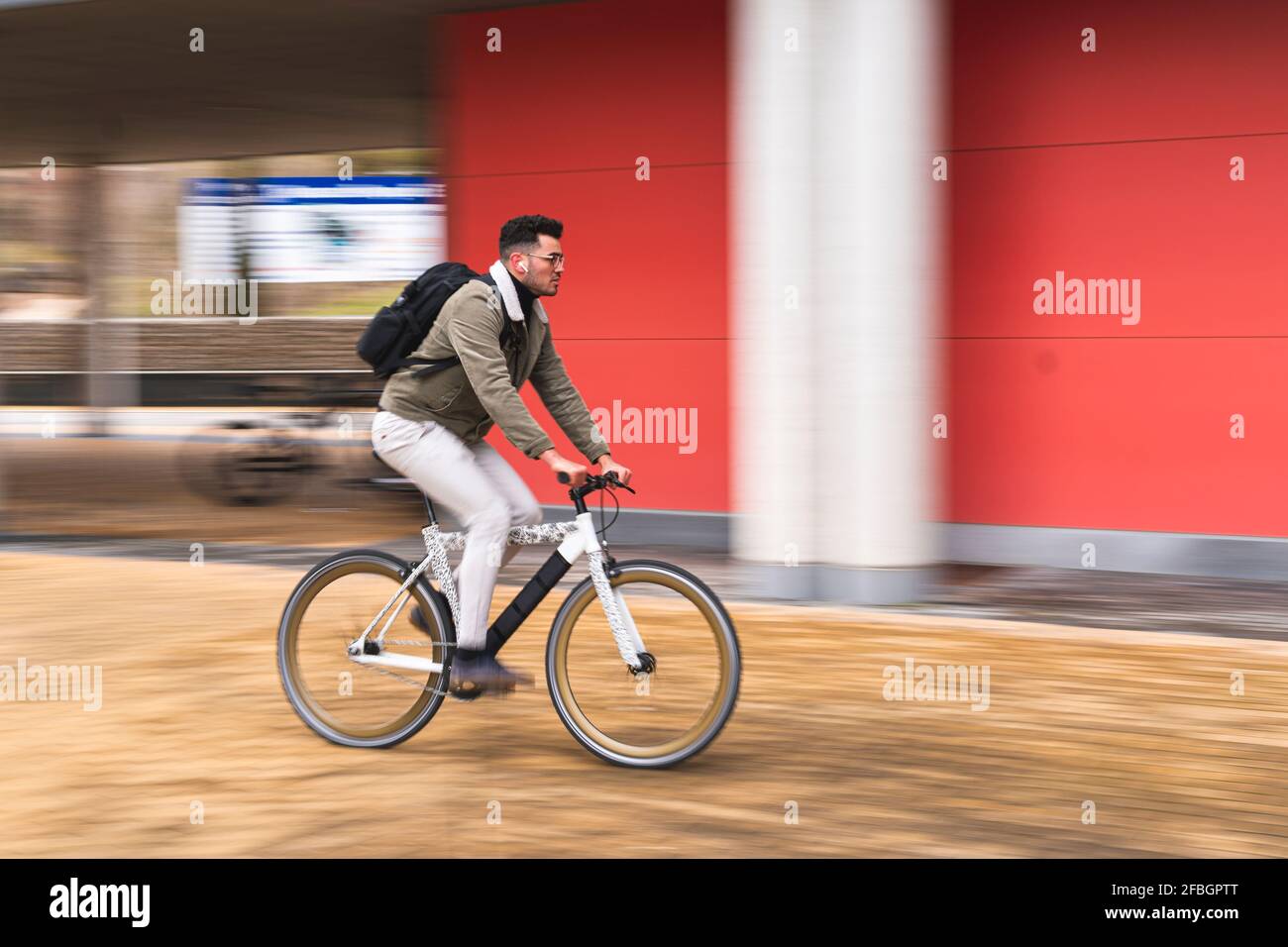 Handsome businessman on bicycle hi-res stock photography and images - Alamy