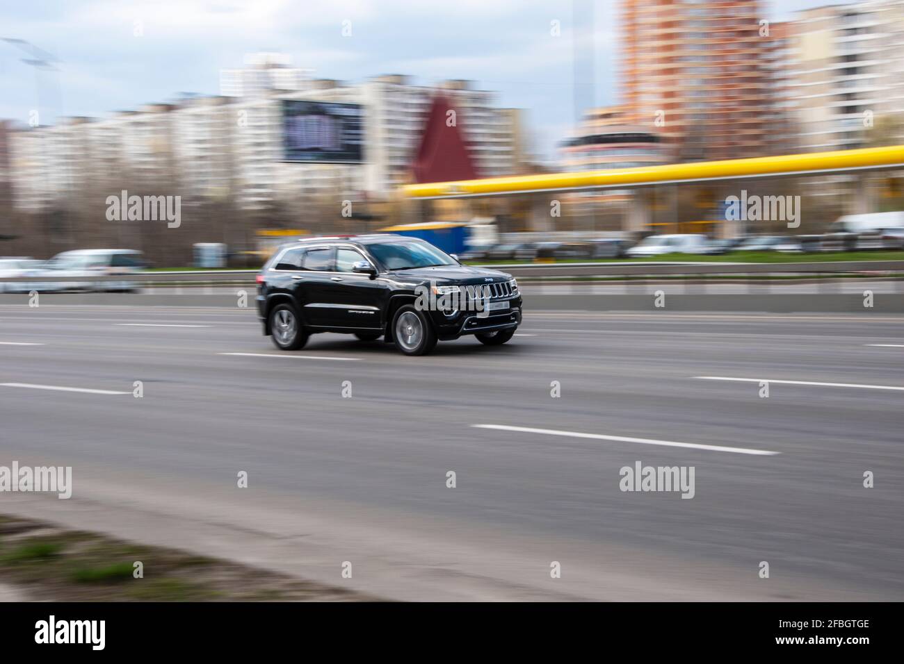 Ukraine, Kyiv - 6 April 2021: Black Jeep Grand Cherokee car moving on ...