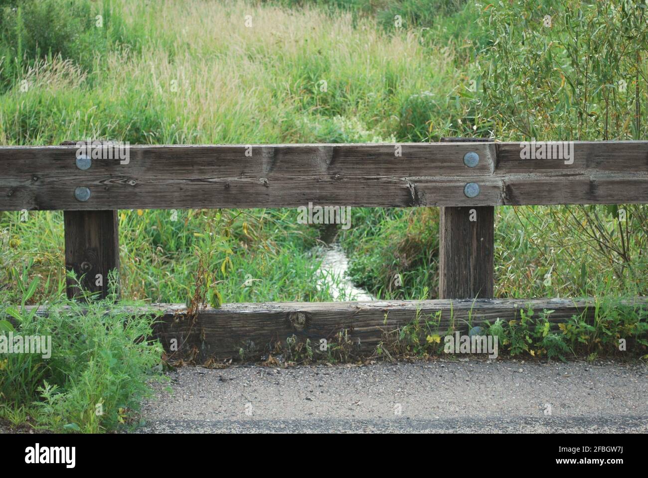 Wood rail of bridge Stock Photo - Alamy