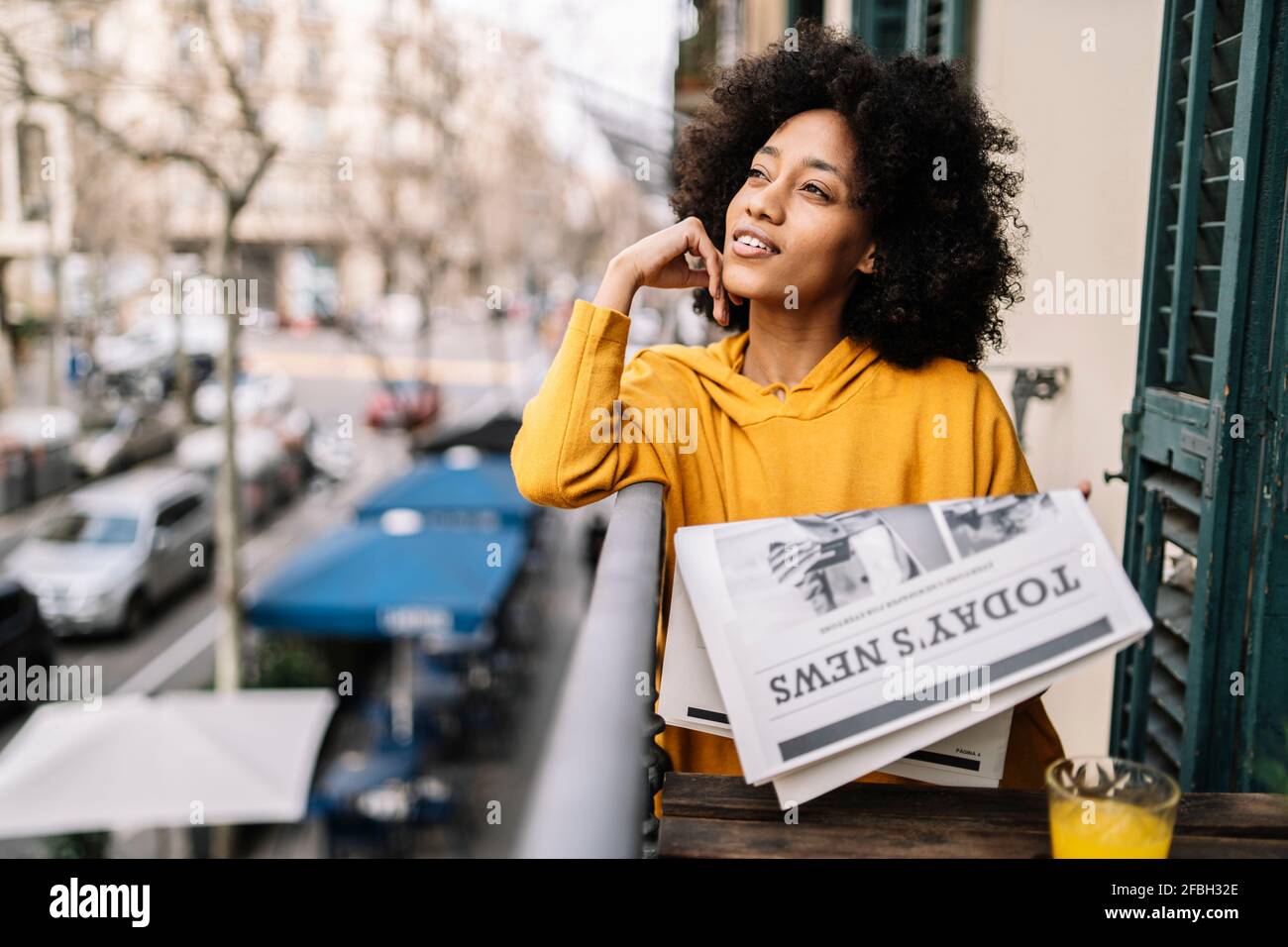 Woman Newspaper Balcony High Resolution Stock Photography and Images ...