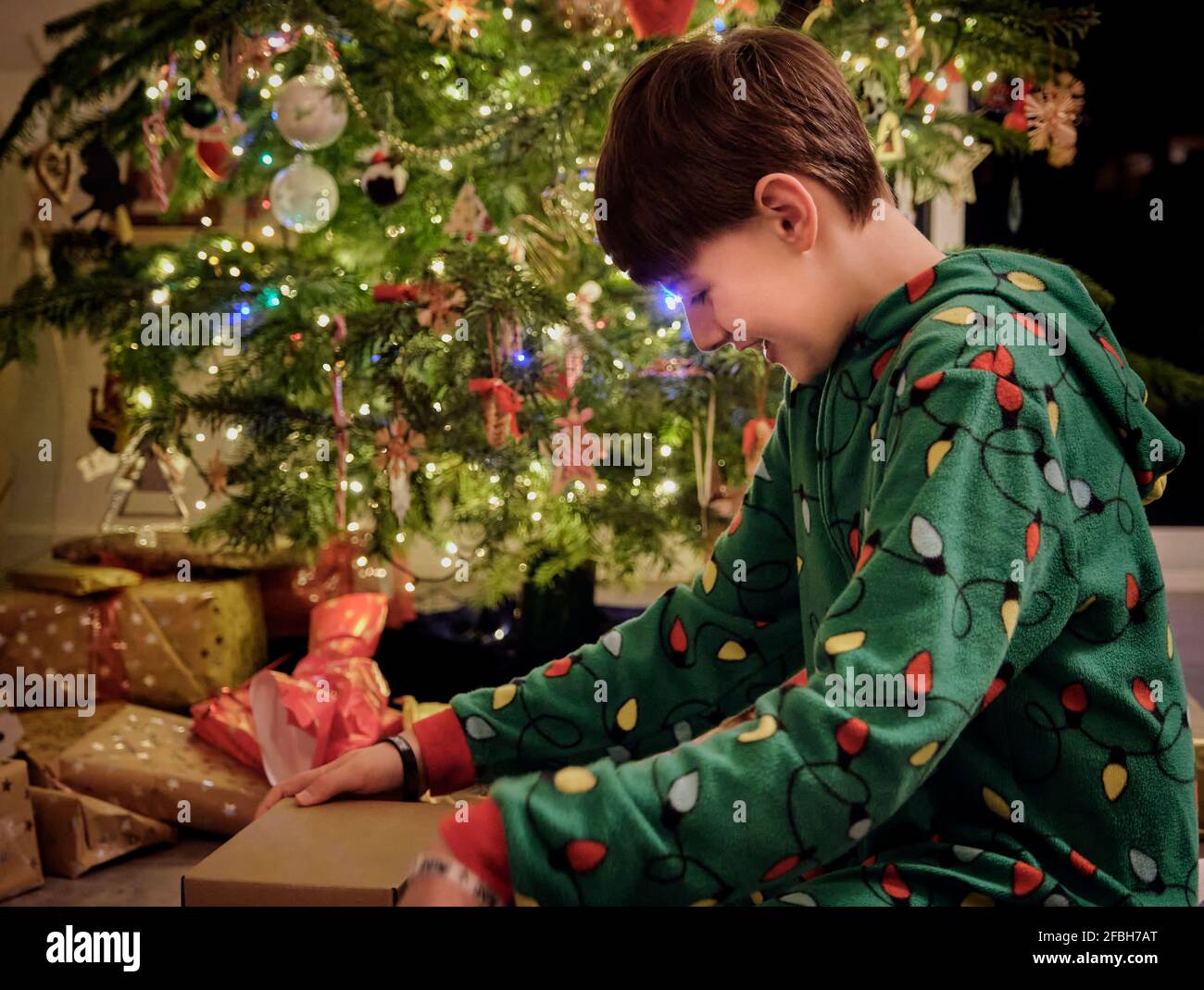 Boy opening box hi-res stock photography and images - Alamy