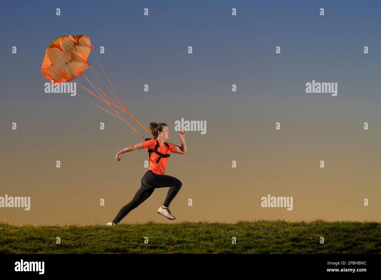 Female runner at sunset hi-res stock photography and images - Alamy