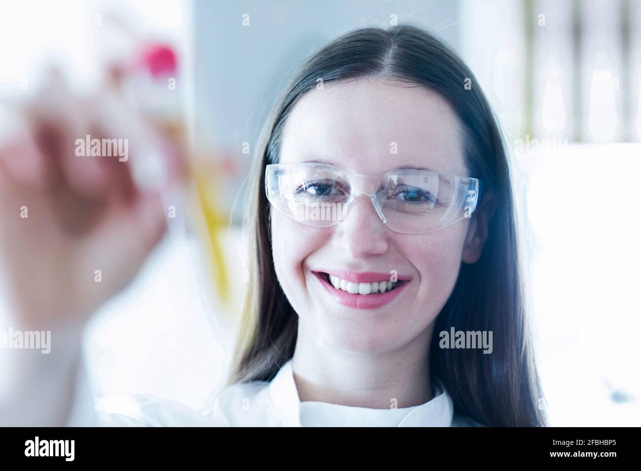 Scientist holding test tube hi-res stock photography and images - Alamy